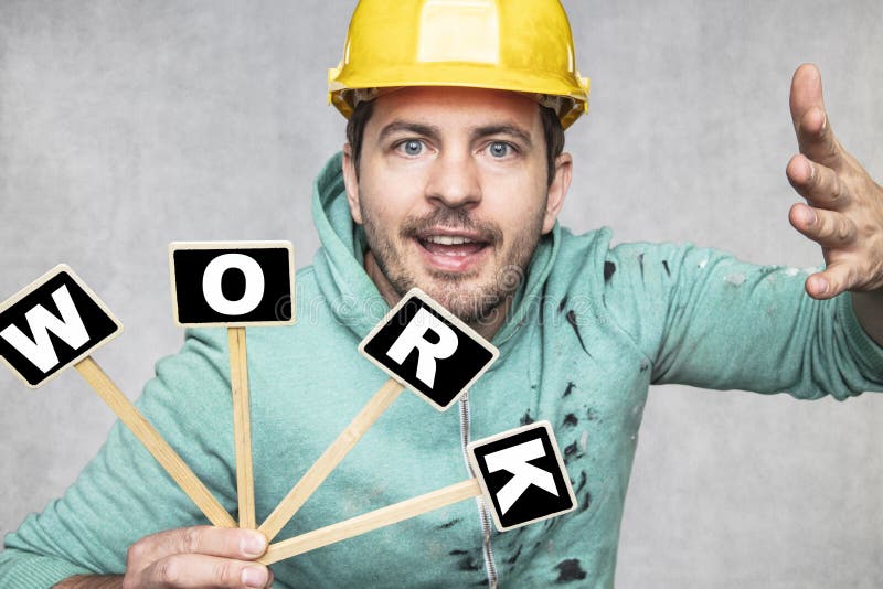 Construction Worker Holding a Blackboard with Space for Text or Text ...