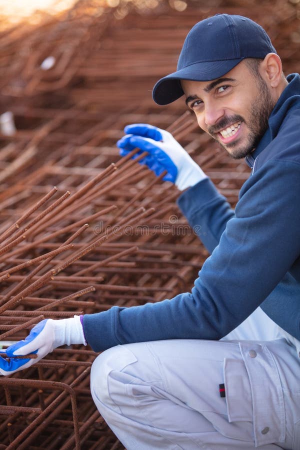 Construction Worker Holding Concrete Reinforcement Bars Stock Photo ...