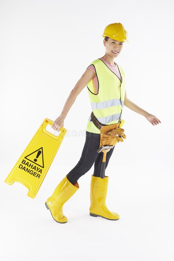 Construction Worker Holding a Danger Sign Stock Photo - Image of ... Construction Worker Holding a Danger Sign Stock Photo - Image of ...