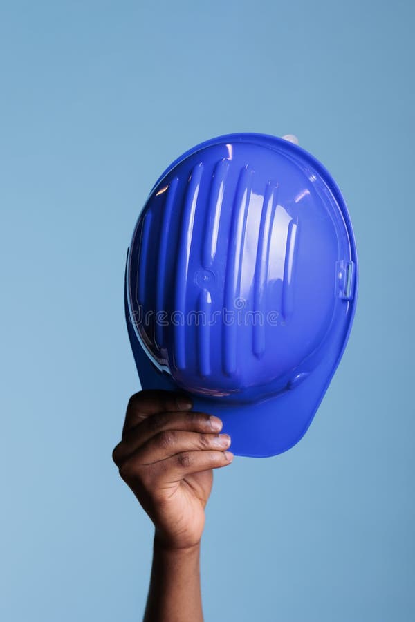 Construction Worker Holding a Protective Helmet Stock Image - Image of ...