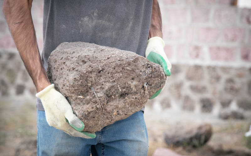 Construction Worker Holding a Quartz Stone Stock Image - Image of rock ...