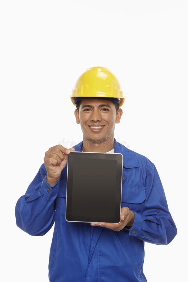 Construction Worker Holding Up a Digital Tablet Stock Photo - Image of ...
