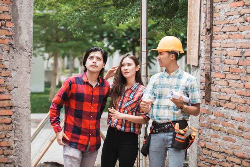 Construction Worker with the House Owner Stock Photo - Image of ...