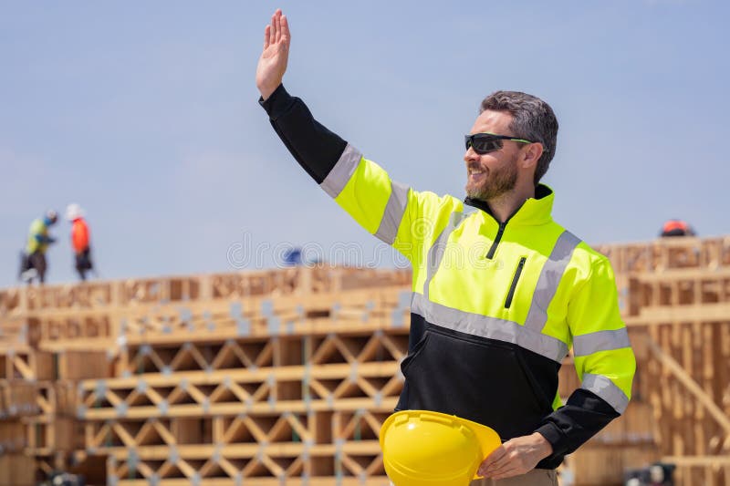 Construction Worker at House Under Construction. Male Builder ...