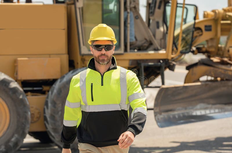 Construction Worker at House Under Construction. Male Builder ...