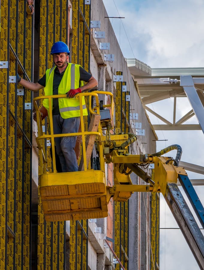 Construction Worker on a Hydraulic Lift Table Platform Editorial Image ...