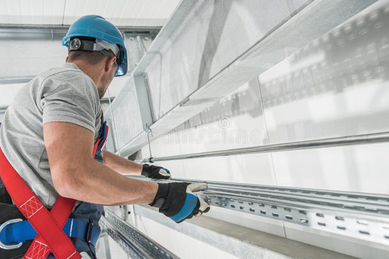 Construction Worker Inside a Warehouse Building Preparing Aluminium ...