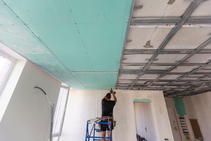 Construction Worker Installation Ceiling Work Stock Photo - Image of ...