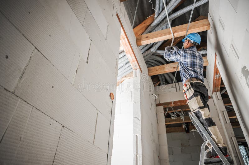 Electrical Wiring Power and Internet Cable during the Construction of a ...