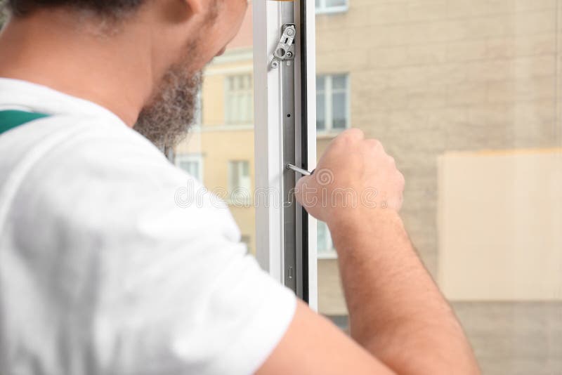 Construction Worker Installing New Window Stock Image - Image of glass ... Construction Worker Installing New Window Stock Image - Image of glass ...