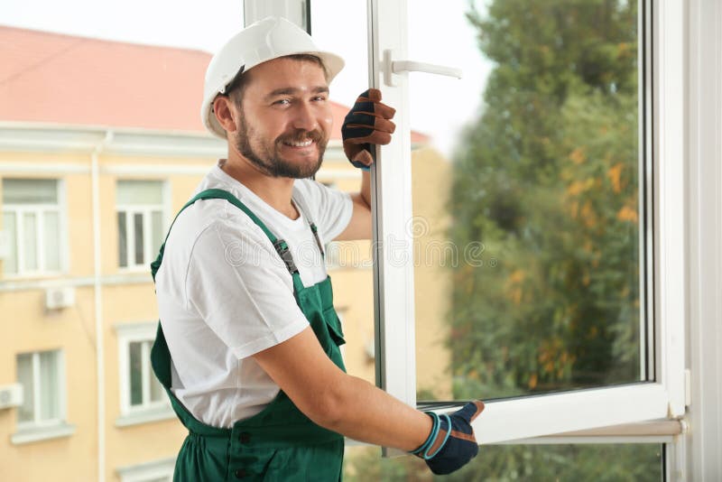 Construction Worker Installing New Window Stock Image - Image of ...