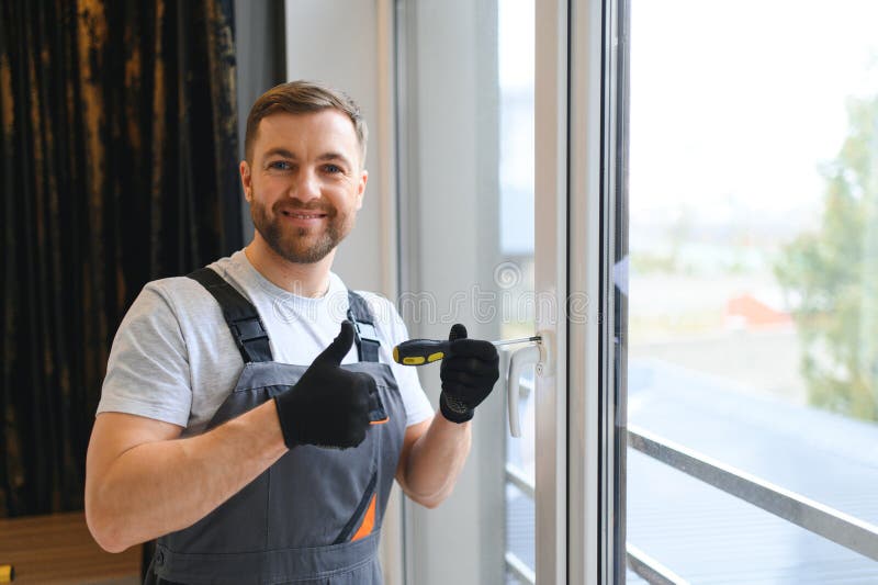 Construction Worker Installing New Window in House Stock Image - Image ...