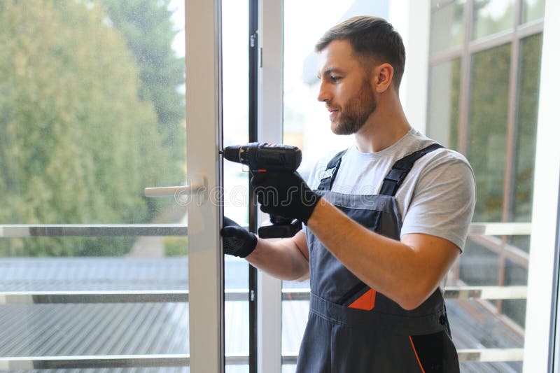 Construction Worker Installing New Window in House Stock Image - Image ...
