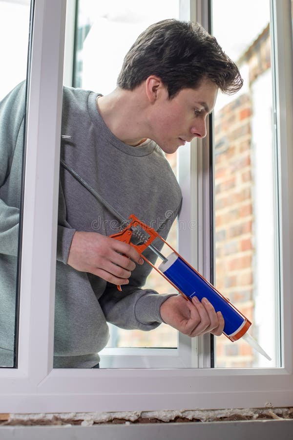 Construction Worker Installing New Windows in House Stock Image - Image ...