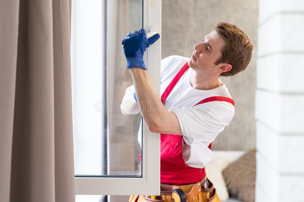 Construction Worker Installing Window in House. Stock Photo - Image of ...
