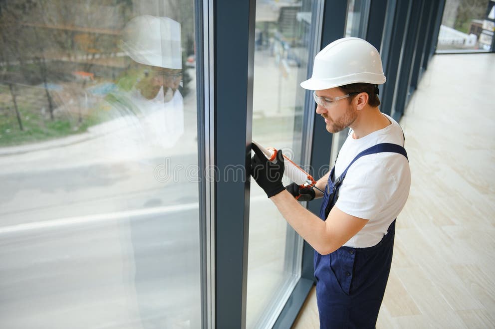 Construction Worker Installing Window in House. Stock Photo - Image of ...