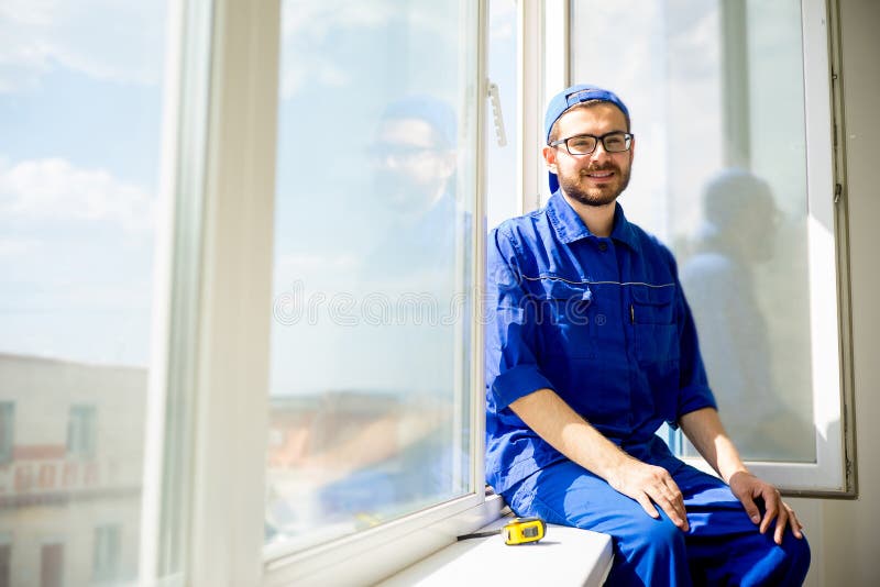 Construction Worker Installing Window Stock Image - Image of builder ...