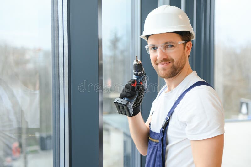 Construction Worker Installing Window in House. Stock Photo - Image of ...