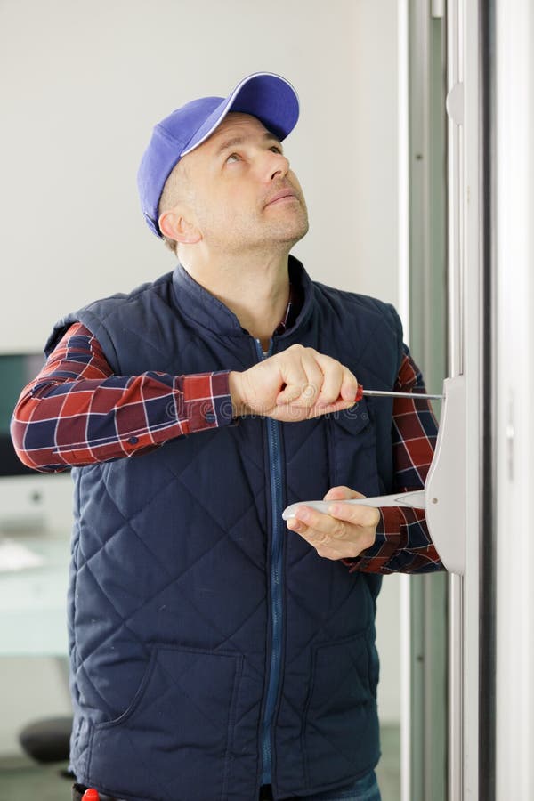 Construction Worker Installing Window in House Stock Image - Image of ... Construction Worker Installing Window in House Stock Image - Image of ...