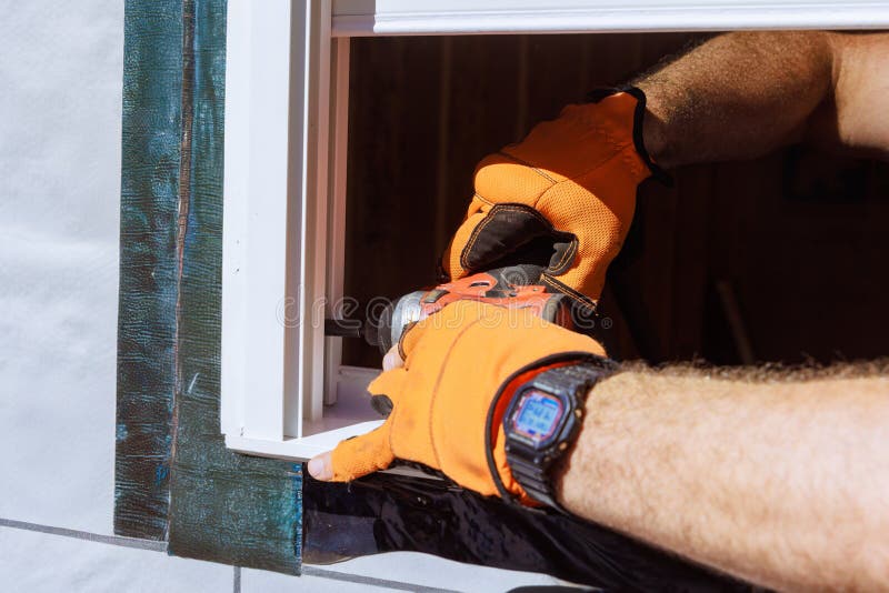 Construction Worker Installs Plastic Windows in New Home with Help of a ...