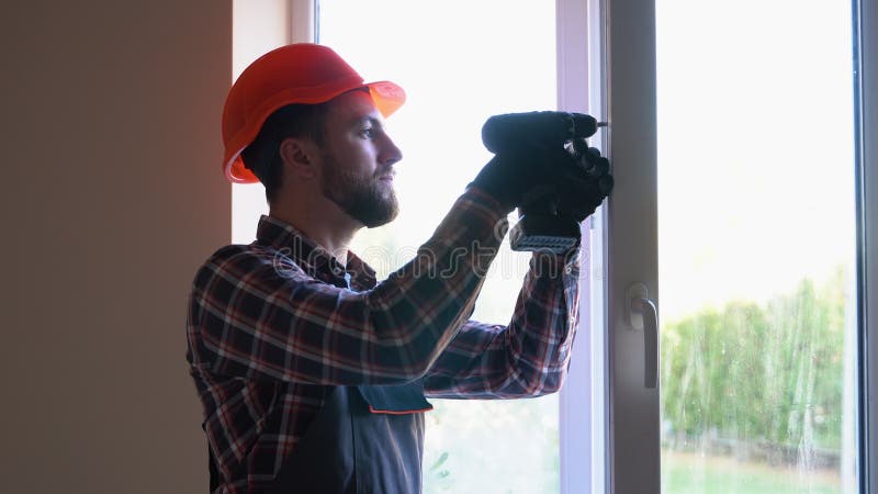 Construction Worker Installs a Window Frame in the Room Stock Video ...