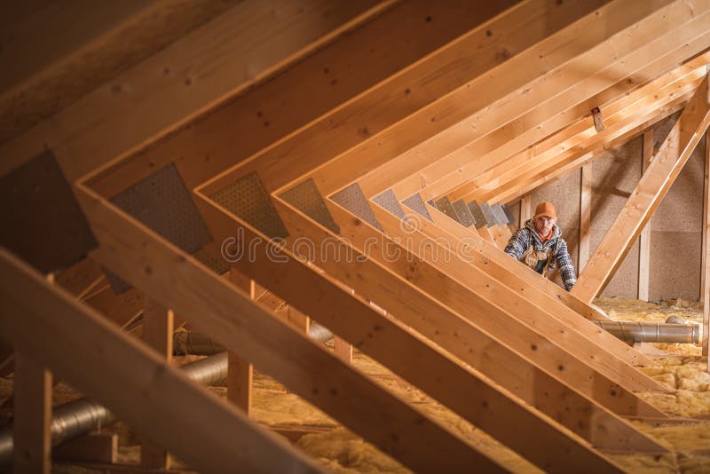 Construction Worker Insulating Attic Space of Home Stock Image - Image ...