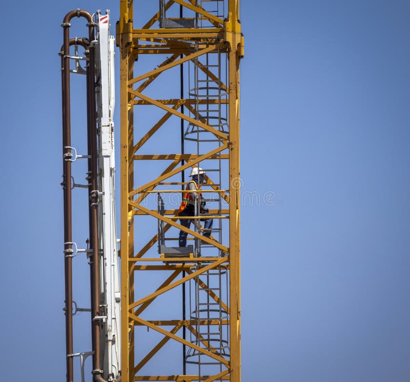 Big yellow tower crane stock image. Image of machinery - 274629083