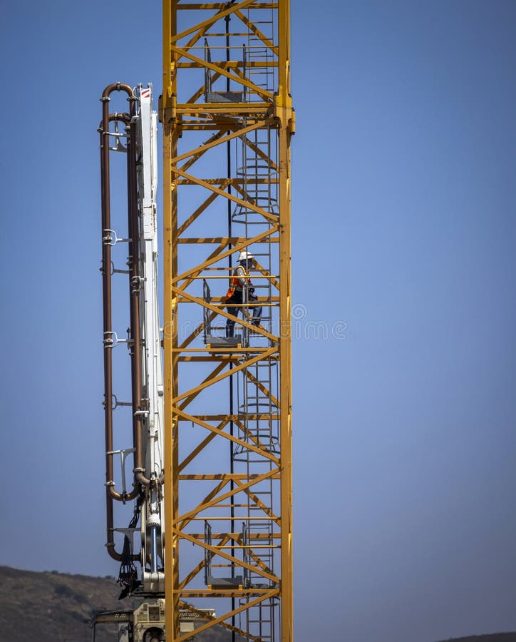 Big yellow tower crane stock image. Image of machinery - 274629083