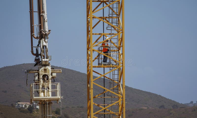 Big yellow tower crane stock image. Image of machinery - 274629083