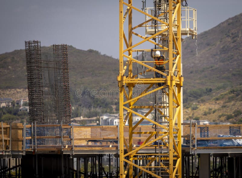 Big yellow tower crane stock image. Image of machinery - 274629083
