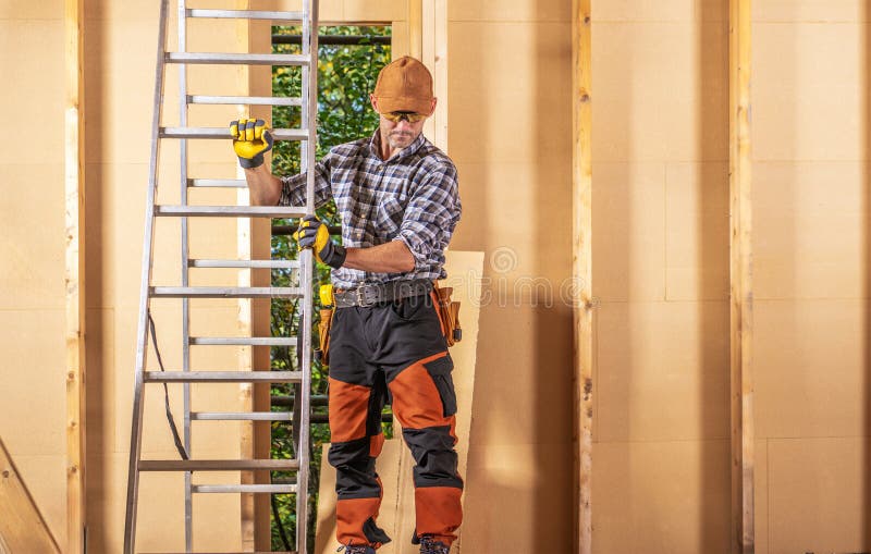 Construction Worker with a Ladder in His Hands Stock Image - Image of ...