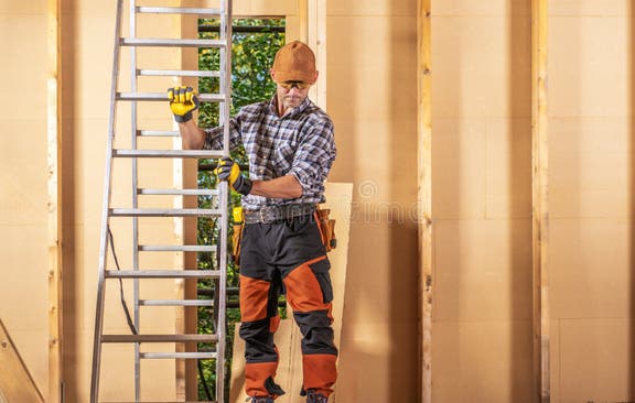 Construction Worker with a Ladder in His Hands Stock Image - Image of ...