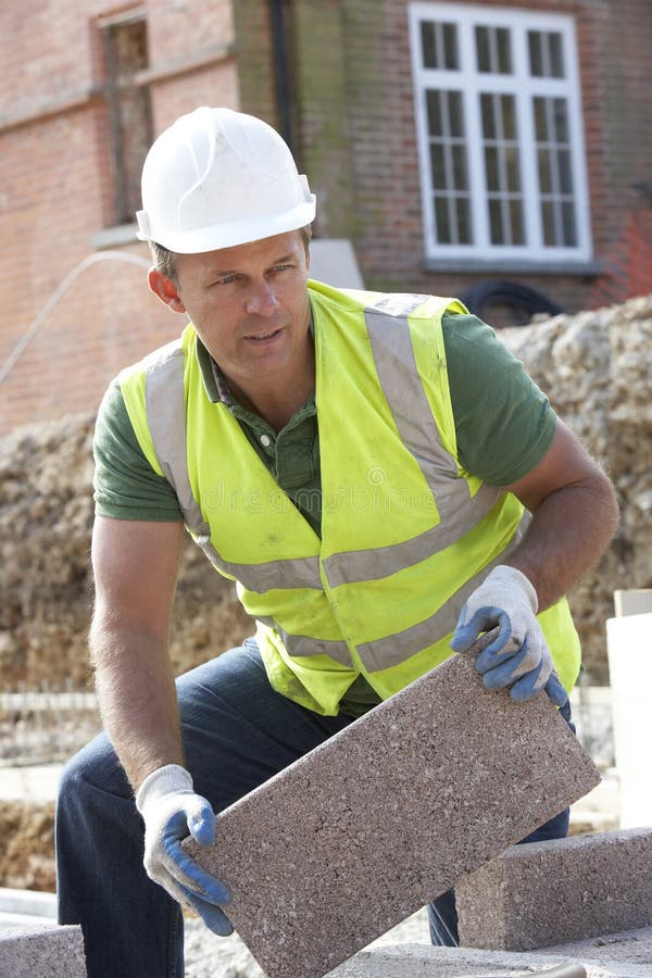 Construction Worker Laying Blockwork Stock Image - Image of visibility ...