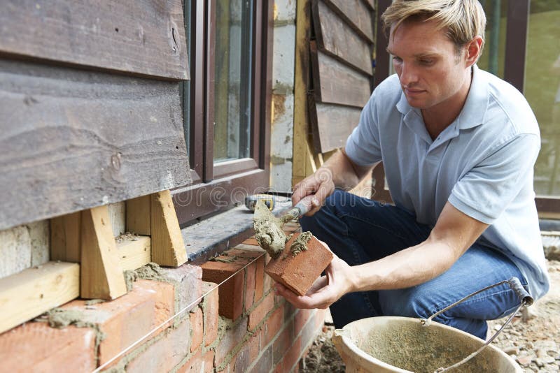 Construction Worker Laying Bricks on Site Stock Photo - Image of brick ...