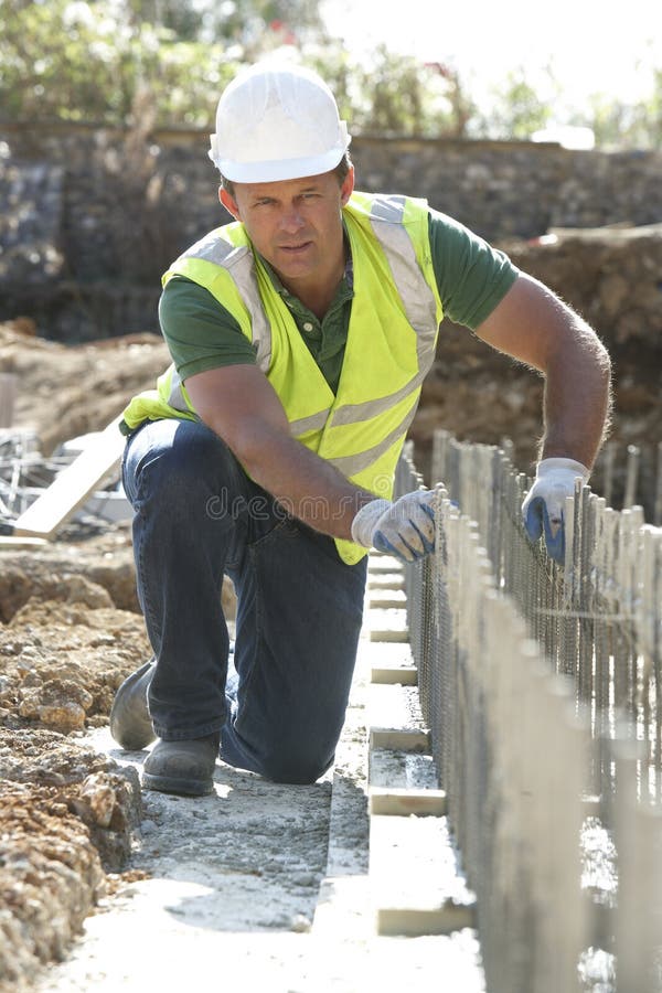 Construction Worker Laying Foundations Stock Image - Image of house ...