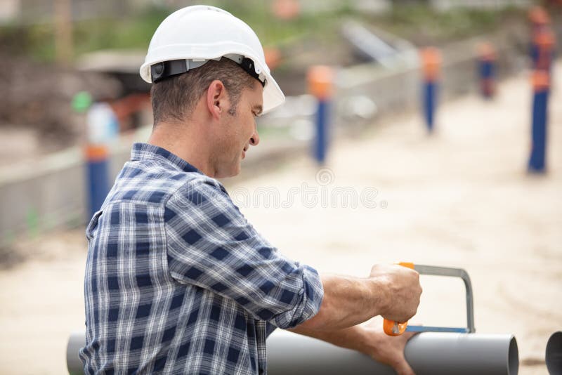 Construction Worker Laying Foundations at Building Site Stock Image ...