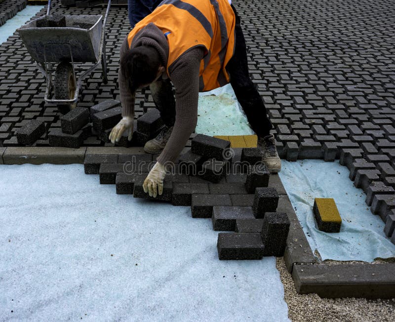 Construction Worker Laying Interlocking Paving Concrete Stock Photo ...
