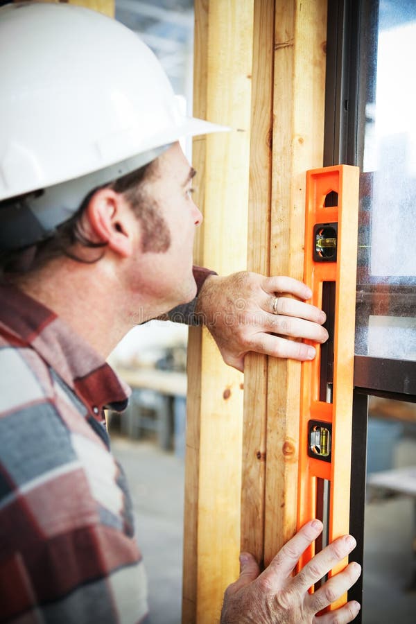 Carpenter Leveling Window stock image. Image of helmet - 2135059