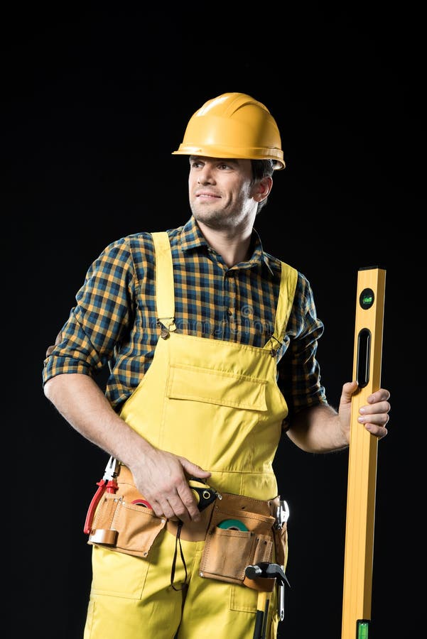 Construction Worker with Level Tool Stock Photo - Image of professional ...