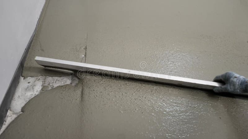 Construction Worker Leveling Concrete Floor Using Trowel Stock Footage ...