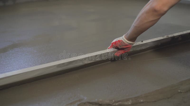 Construction Worker Leveling Concrete Using a Bull Float. Stock Video ...