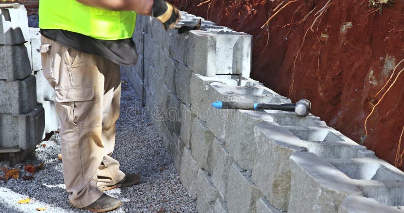 Construction Worker Lifted Concrete Block and Positioned it on ...