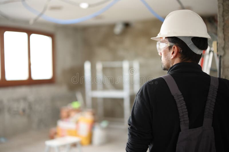 Construction Worker Looking at Site after Work Stock Photo - Image of ...