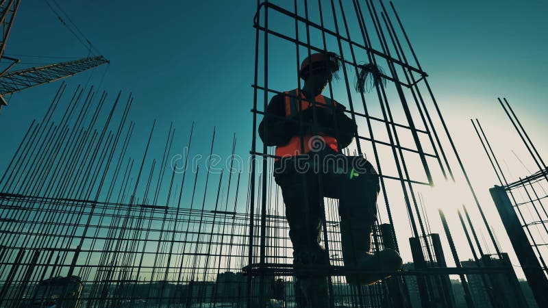 Construction Worker is Making a Metal Framework on the Roof Stock Video ...