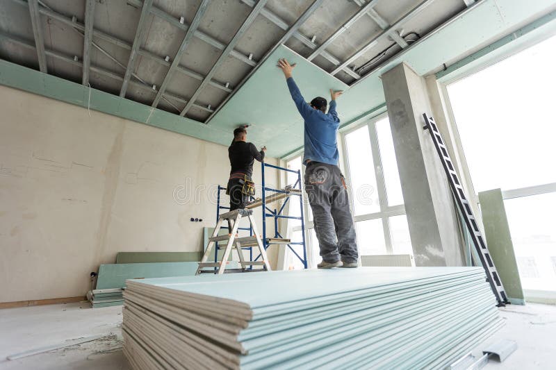 Construction Worker, Making Walls from Gypsum Plasterboard or Drywall Stock Image - Image of ...