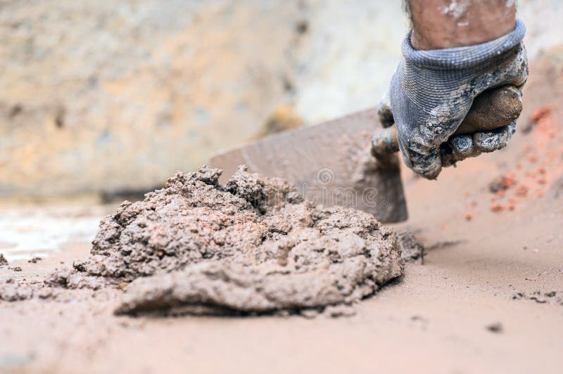 Construction Worker Man Hand Using Trowel To Mix Mortar. Stock Photo ...