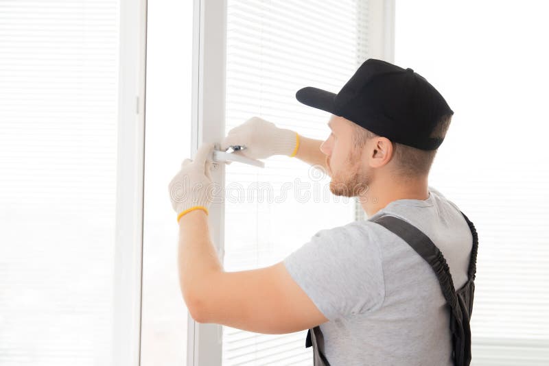 Construction Worker Man Install Plastic White Upvc Windows in House ...