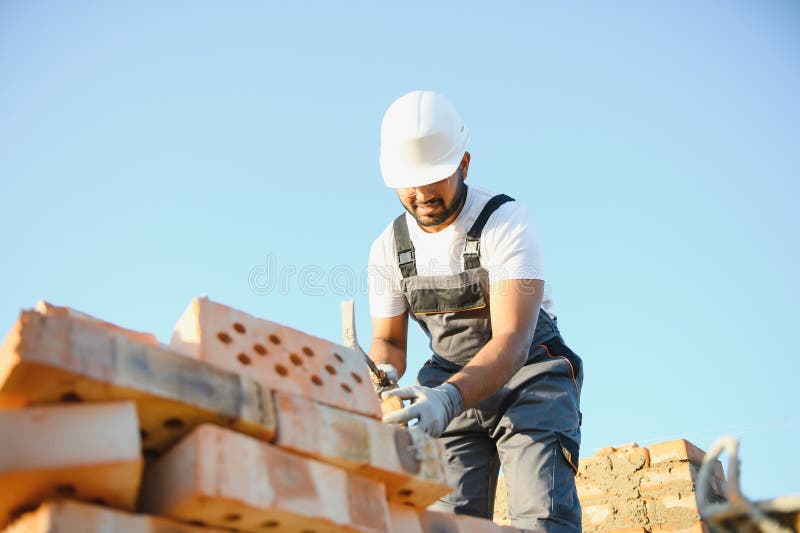 Indian Construction Worker Man in Work Clothes and a Construction ...