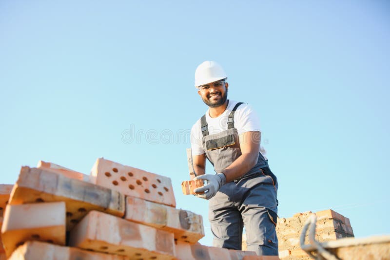 Indian Construction Worker Man in Work Clothes and a Construction ...