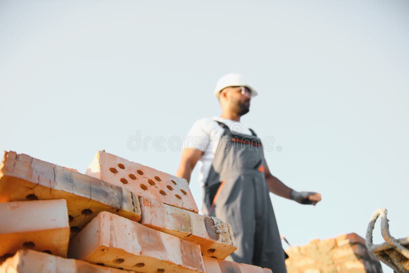 Indian Construction Worker Man in Work Clothes and a Construction ...